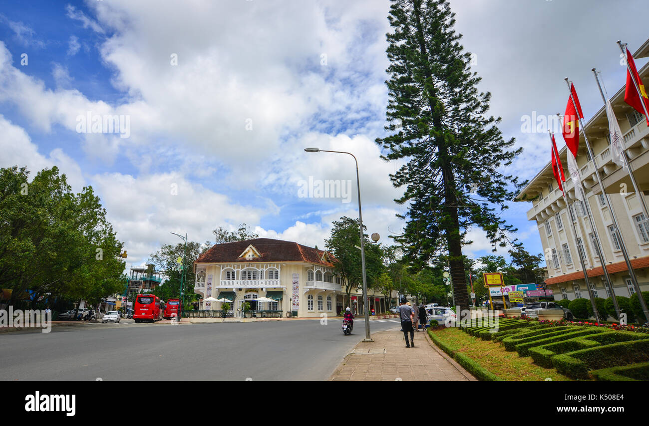 Dalat, Vietnam - Aug 19, 2017. People with vehicles on street in Dalat ...