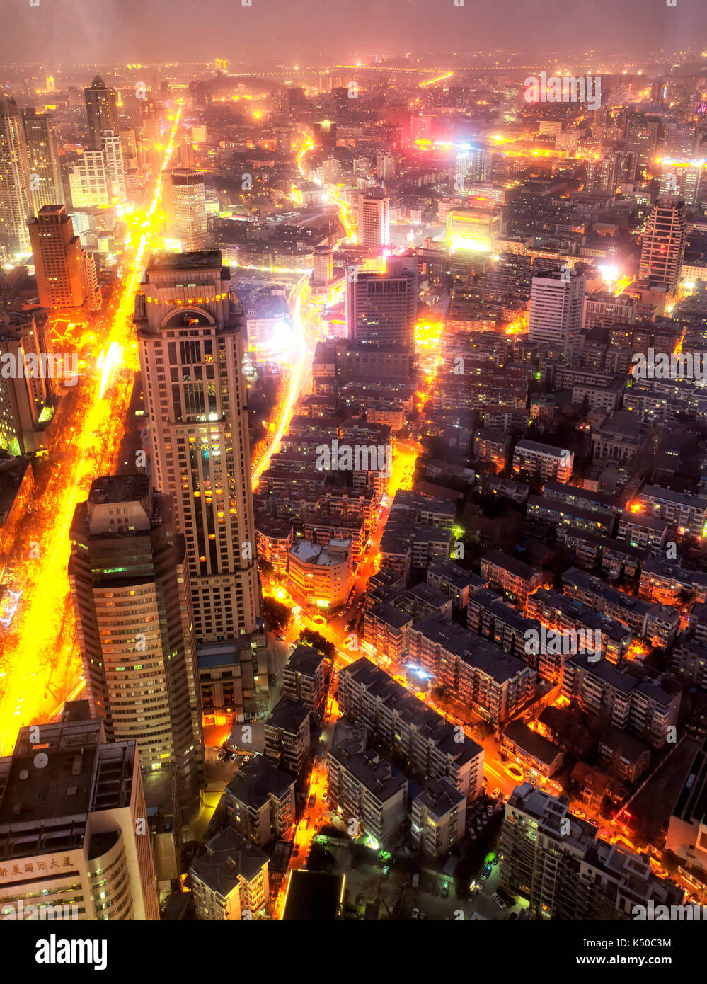 The city of nanjing china lit up at night as seen from the top of ...