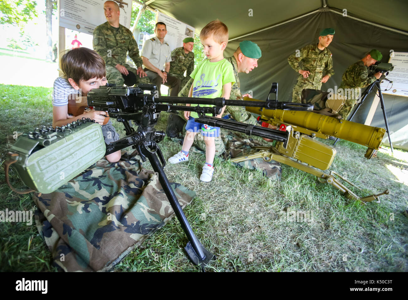 ZAGREB, CROATIA - MAY 28, 2017 : A boy checking the PK Zastava M84 ...