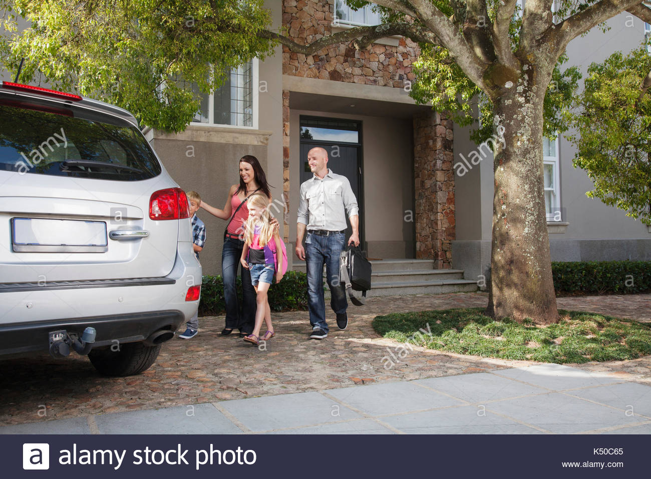 Family Leaving House Stock Photos & Family Leaving House Stock Images ...