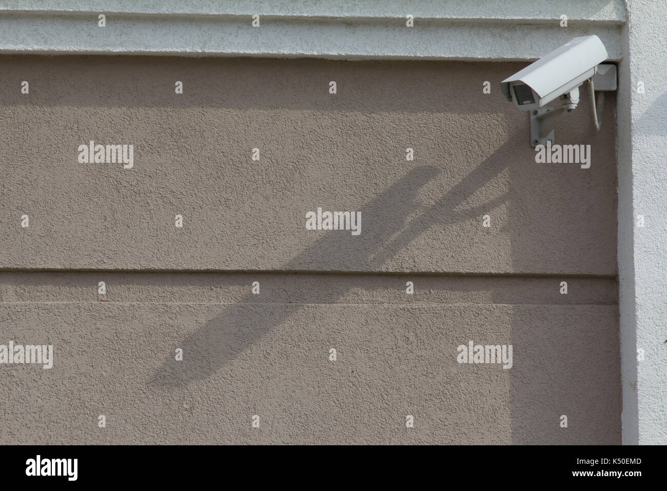 Big CCTV Camera on the wall of building - telephoto Stock Photo - Alamy