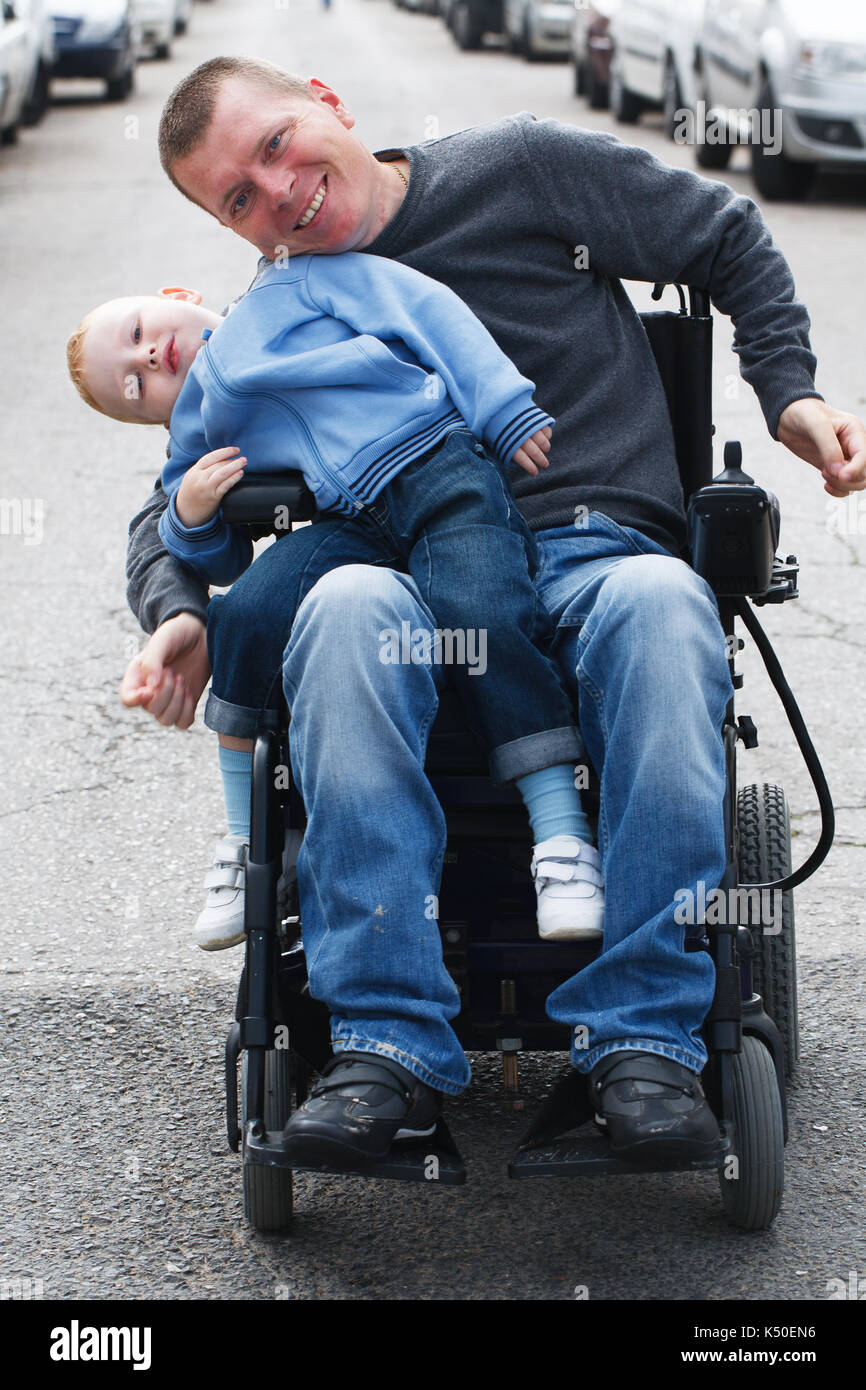 Little people wheelchair hi-res stock photography and images - Alamy
