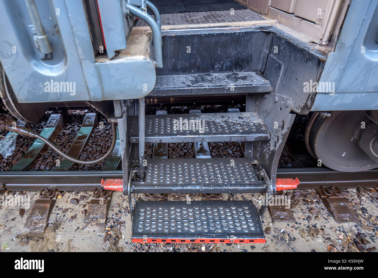 Small metal staircase for train access Stock Photo - Alamy