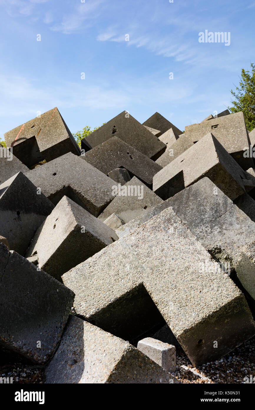 Concrete tank traps on the beach at Grain village on the Isle of Grain ...