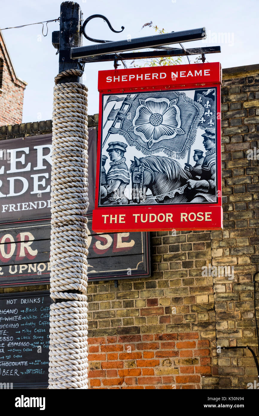 The Tudor Rose pub sign, a Shepherd Heame pub in the village of Upnor ...