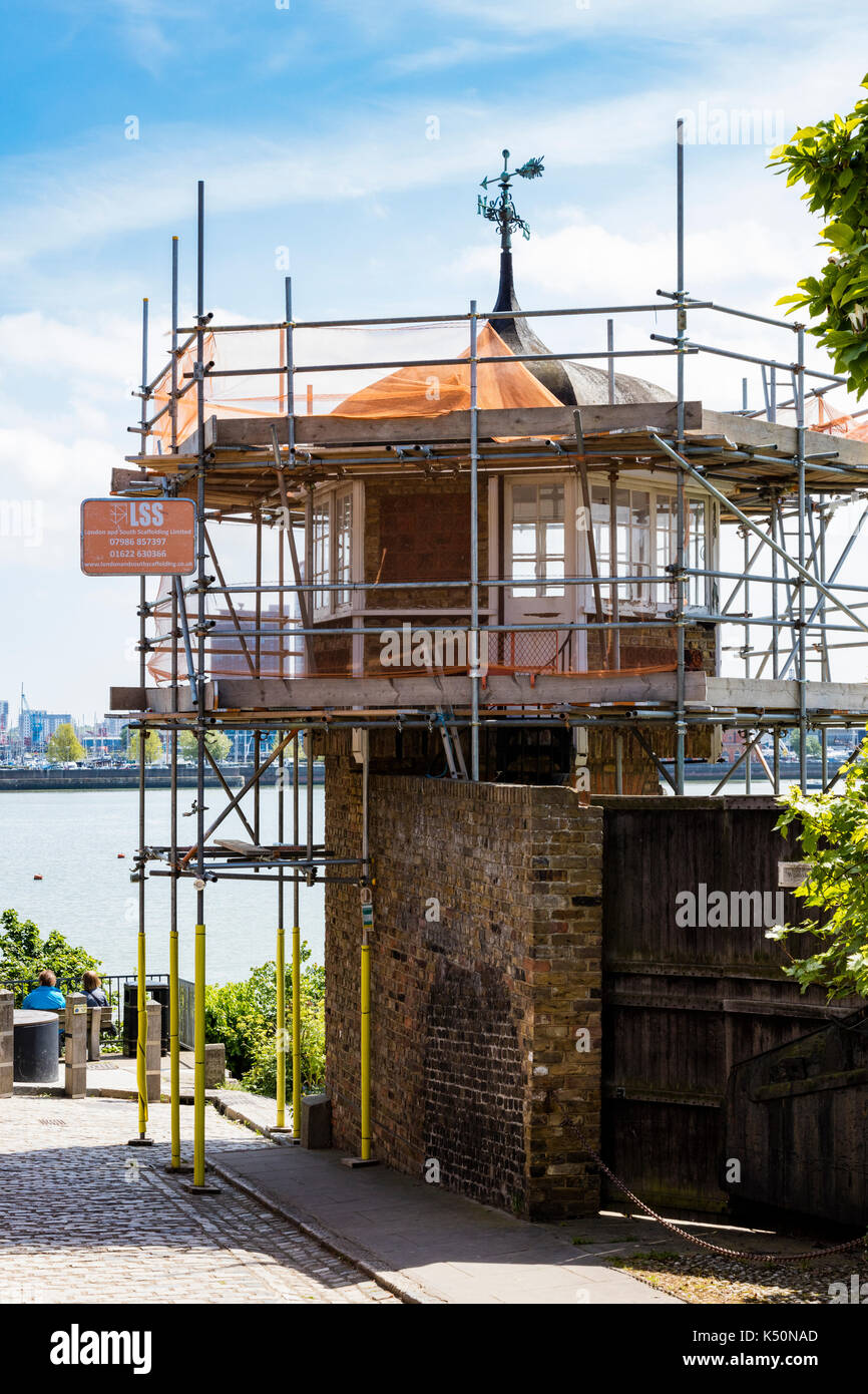 Scaffolding around a pretty and historic summer house on Upnor High ...