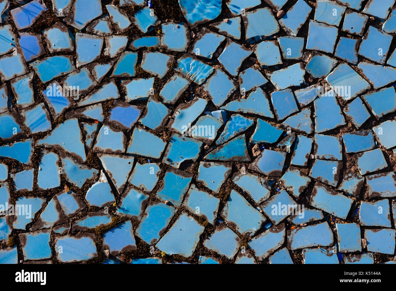 mosaic on the bottom of destroyed pool Stock Photo - Alamy