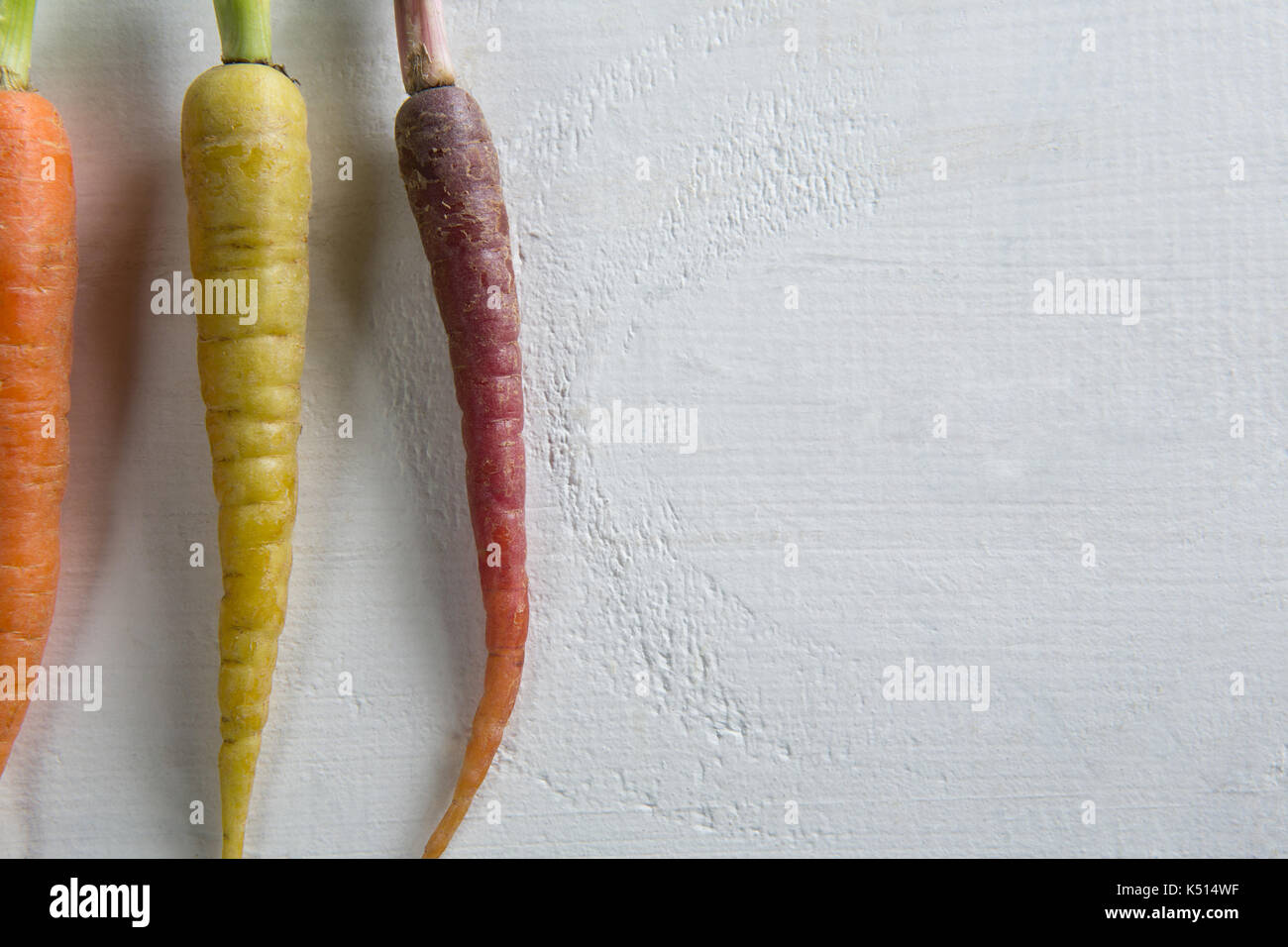 Overhead view of carrots arranged side by side Stock Photo - Alamy