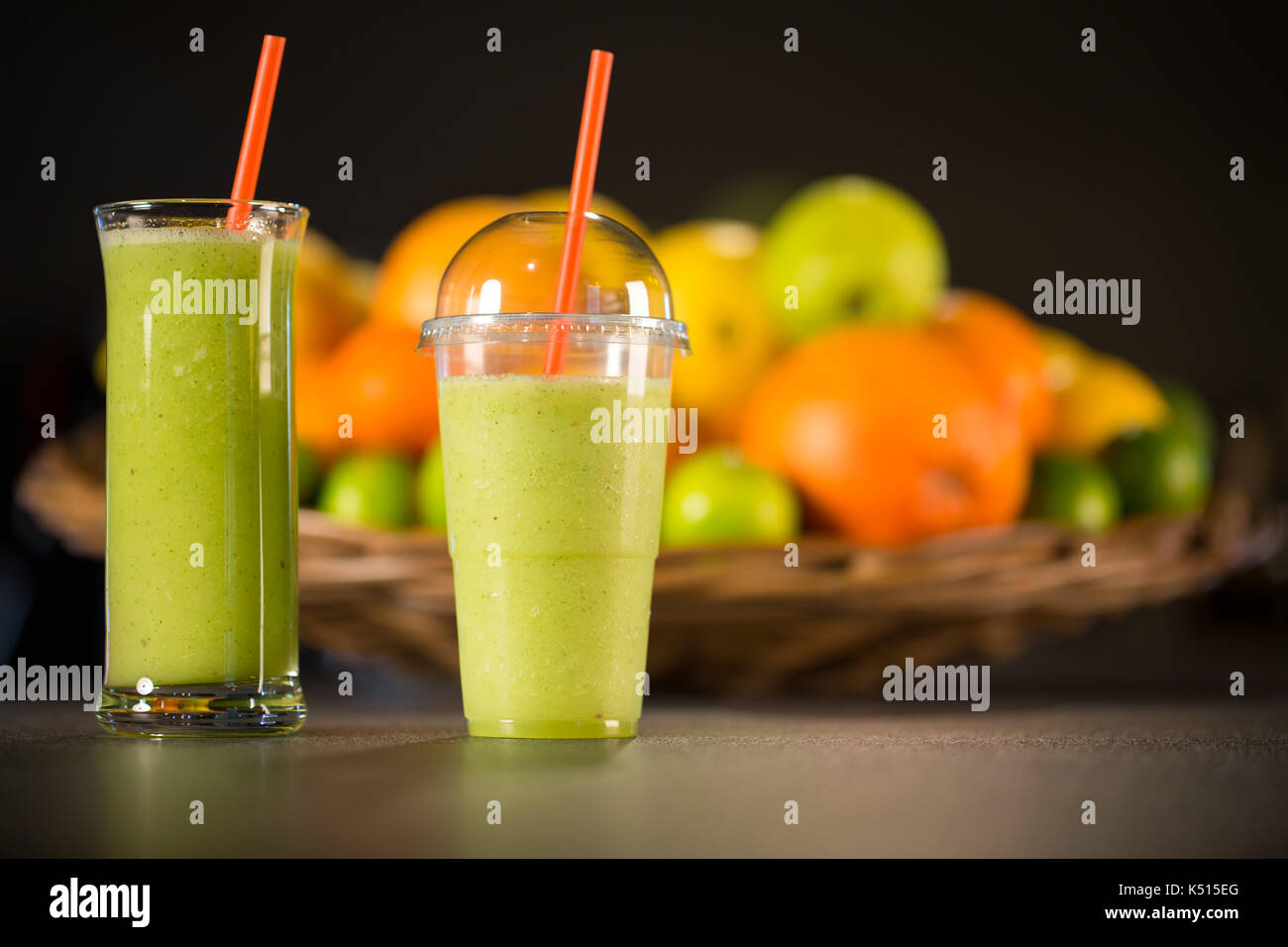plastic glass to go, of fresh green smoothie made from mint, apple and ...