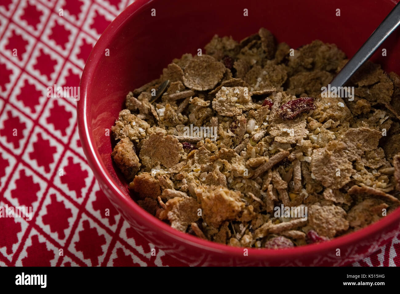 Close-up of wheat flakes in bowl on napkin Stock Photo - Alamy