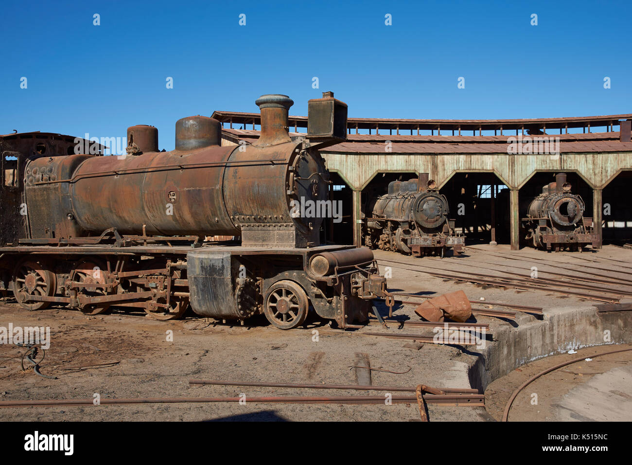 Old steam locomotives at the historic engine shed at Baquedano Railway ...