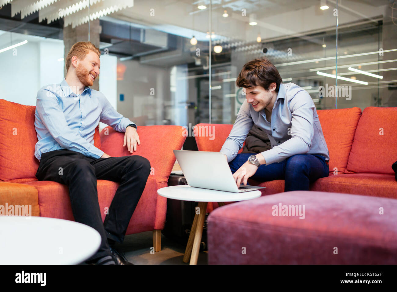 Business colleagues resting during break Stock Photo - Alamy