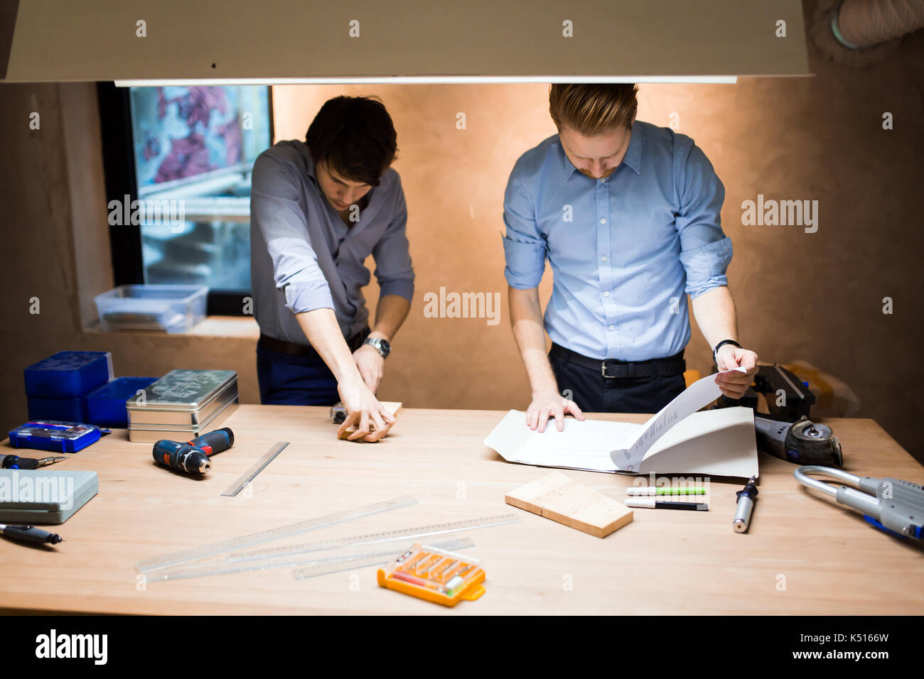 Two designers working together Stock Photo - Alamy
