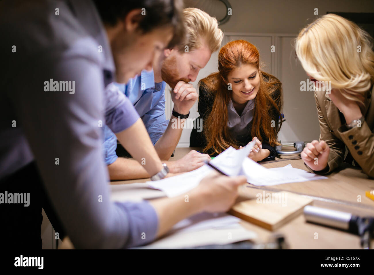 Creative workers designing and planing Stock Photo - Alamy