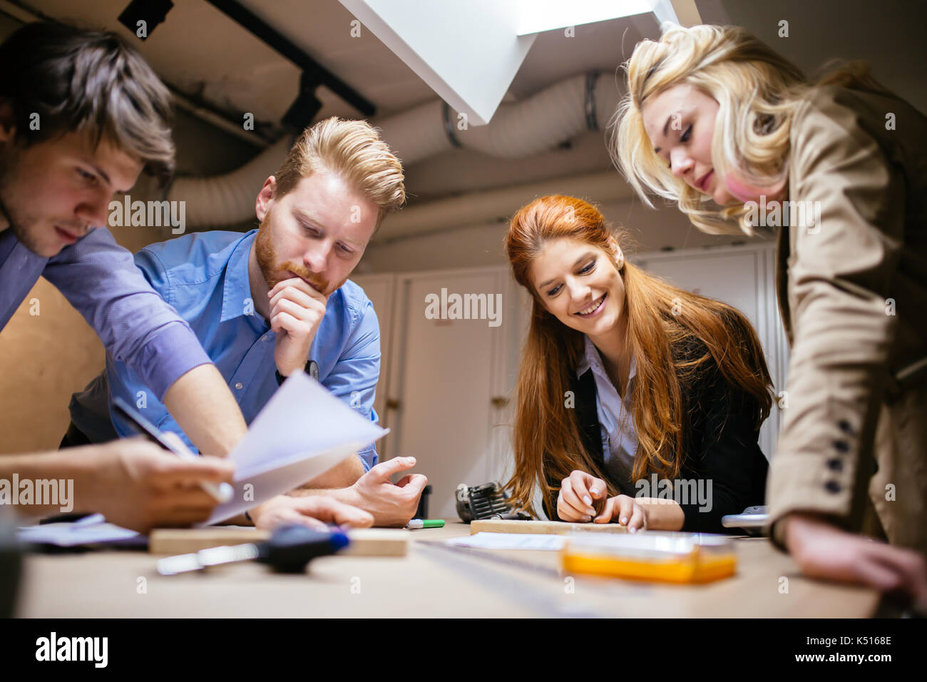 Creative workers designing and planing Stock Photo - Alamy