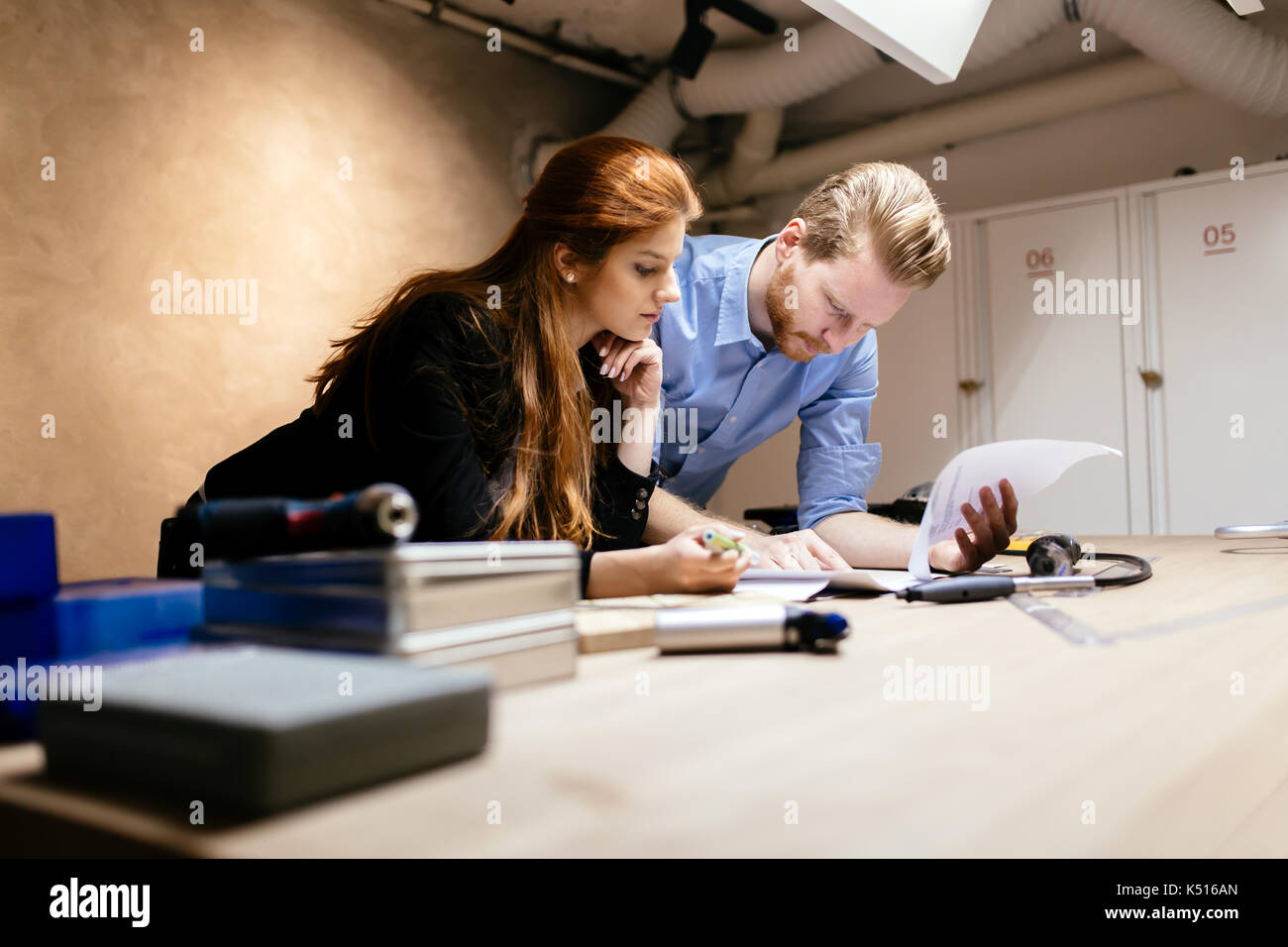 People working in modern beautiful workshop Stock Photo - Alamy