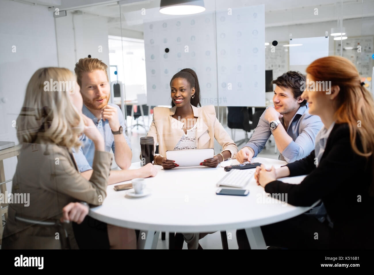 Business people meeting at round table Stock Photo - Alamy