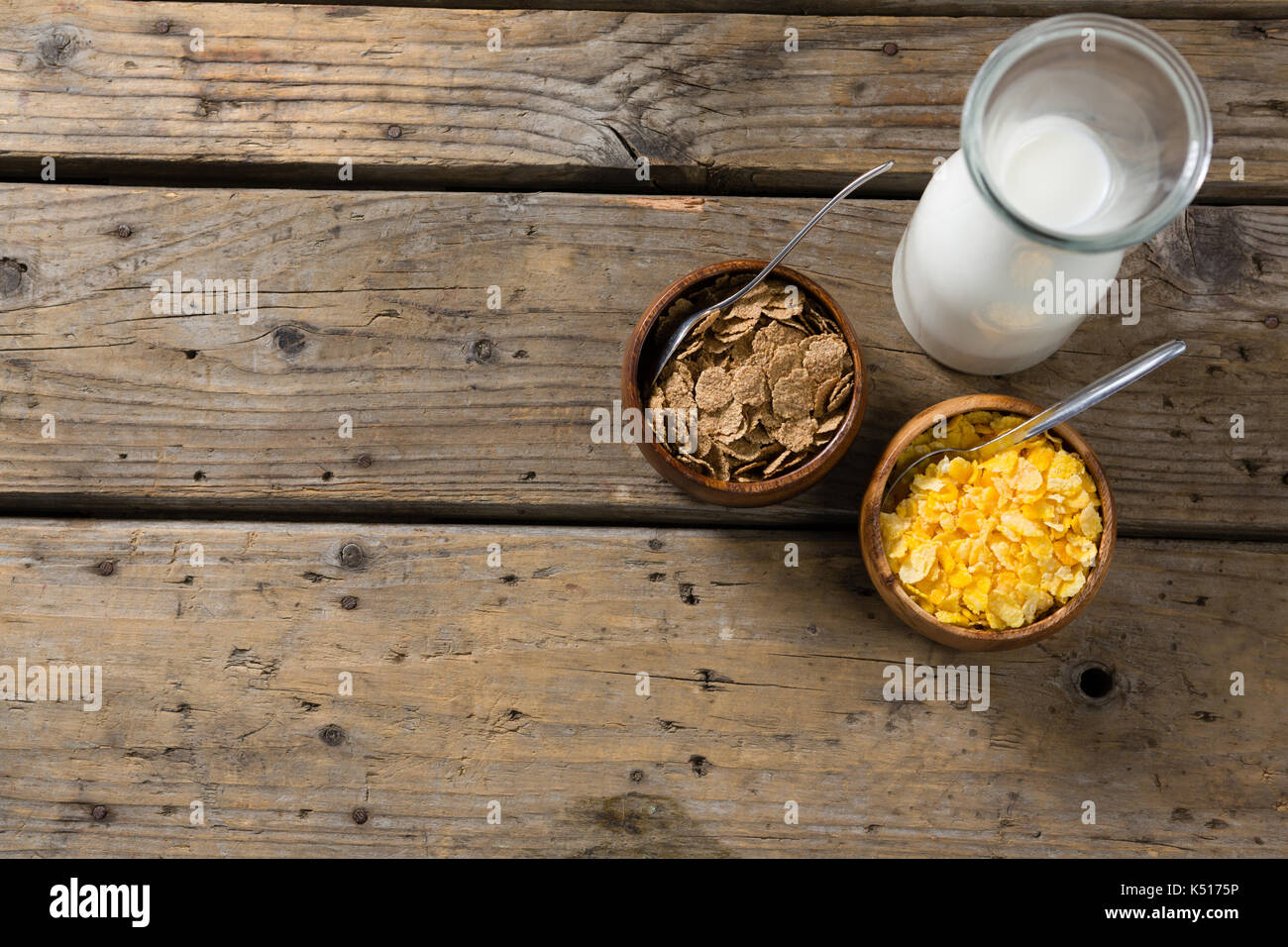 Wheat flakes and wheaties cereal in bowl on white background Stock ...