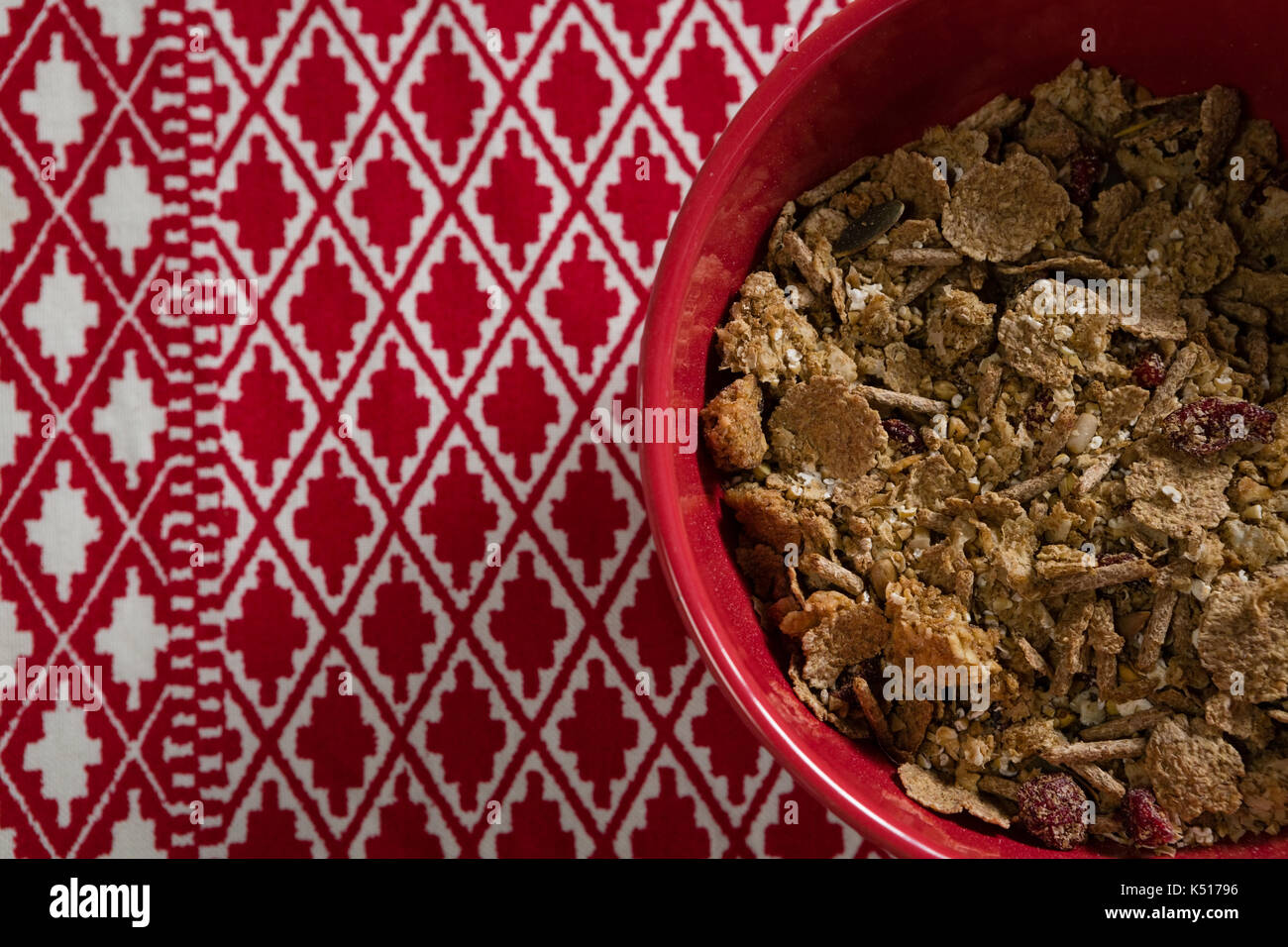 Close-up of wheat flakes in bowl on napkin Stock Photo - Alamy