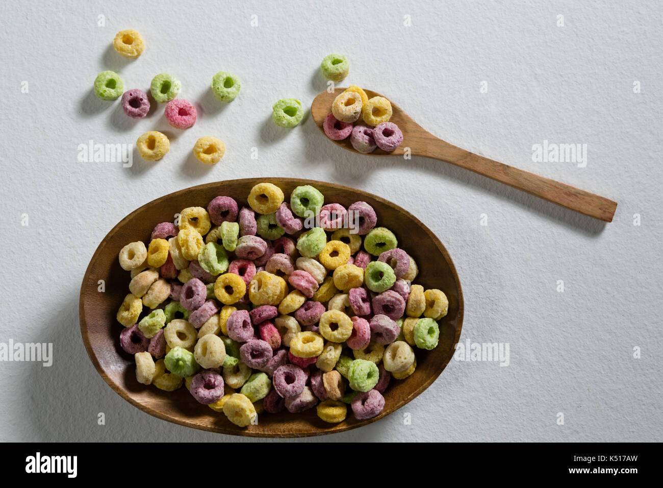 Froot loops in plate on white background Stock Photo - Alamy