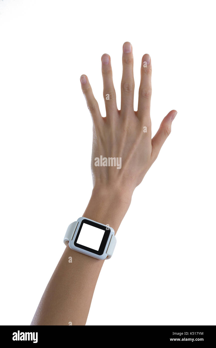 Womans hand showing smartwatch against white background Stock Photo - Alamy