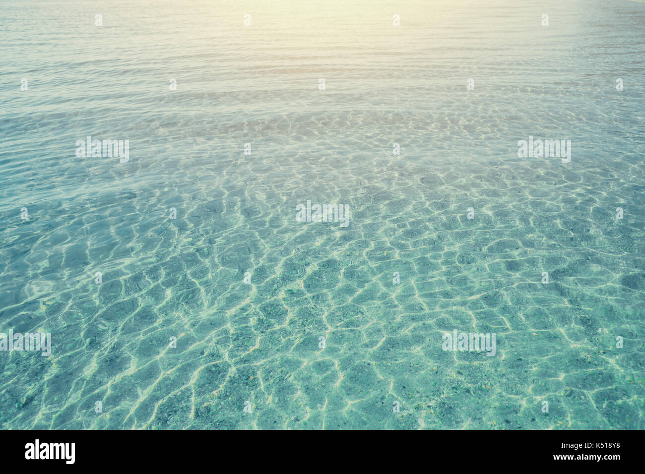 sea water clean and clear wave. ocean with the morning sun light Stock ...