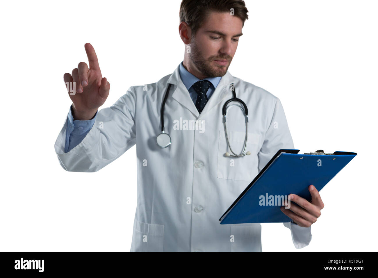 Male doctor using invisible screen against white background Stock Photo ...
