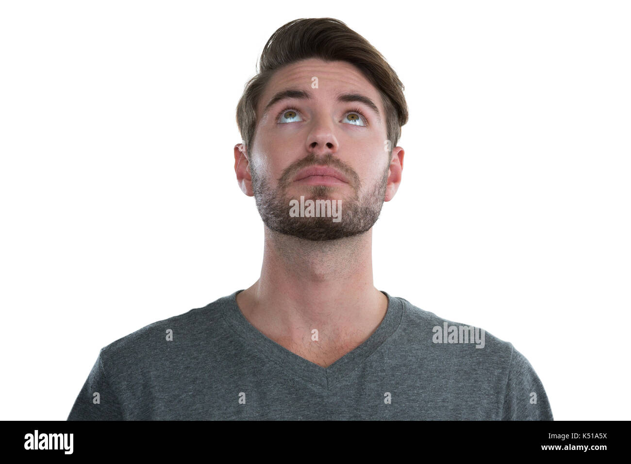 Man looking up against white background Stock Photo - Alamy