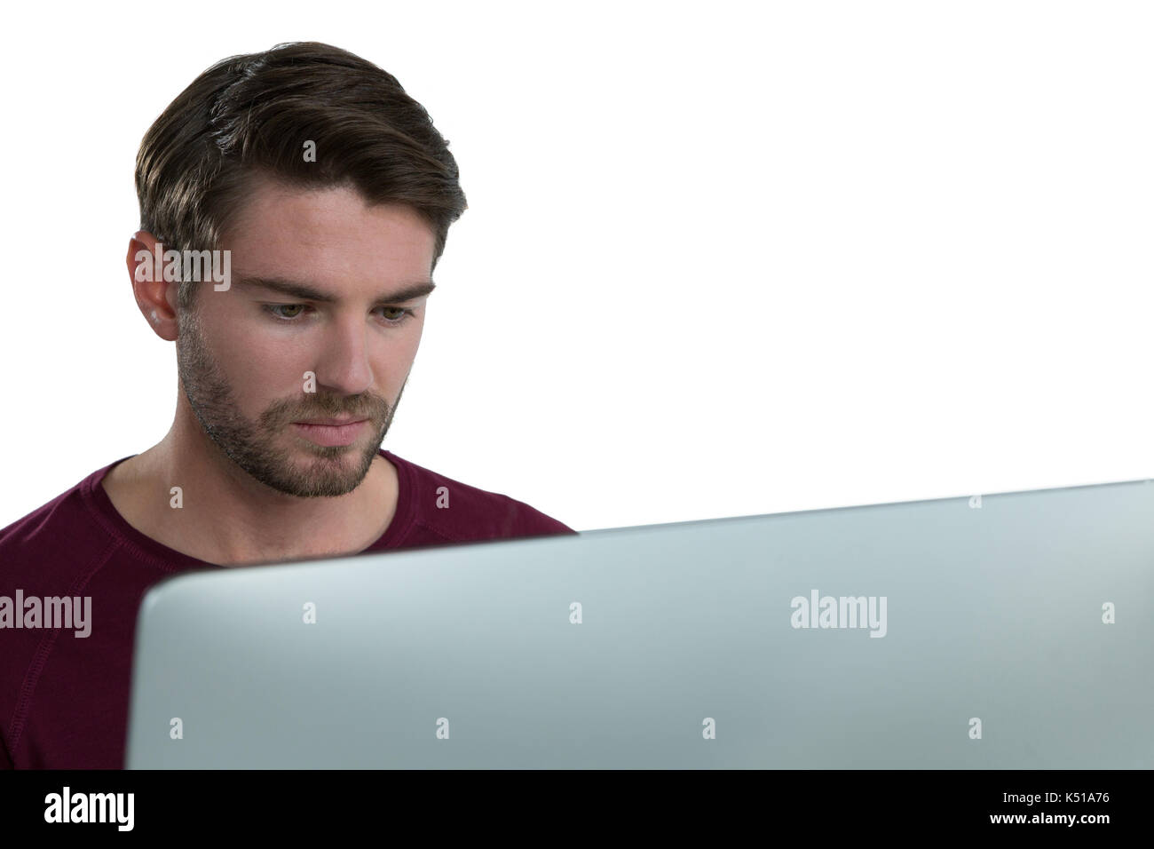 Man using computer against white background Stock Photo - Alamy