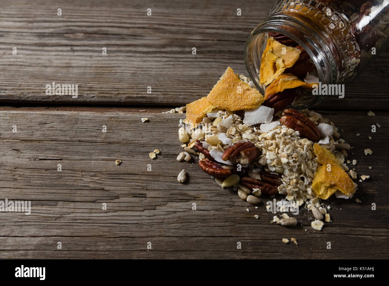 Spilling from glass jar hi-res stock photography and images - Alamy