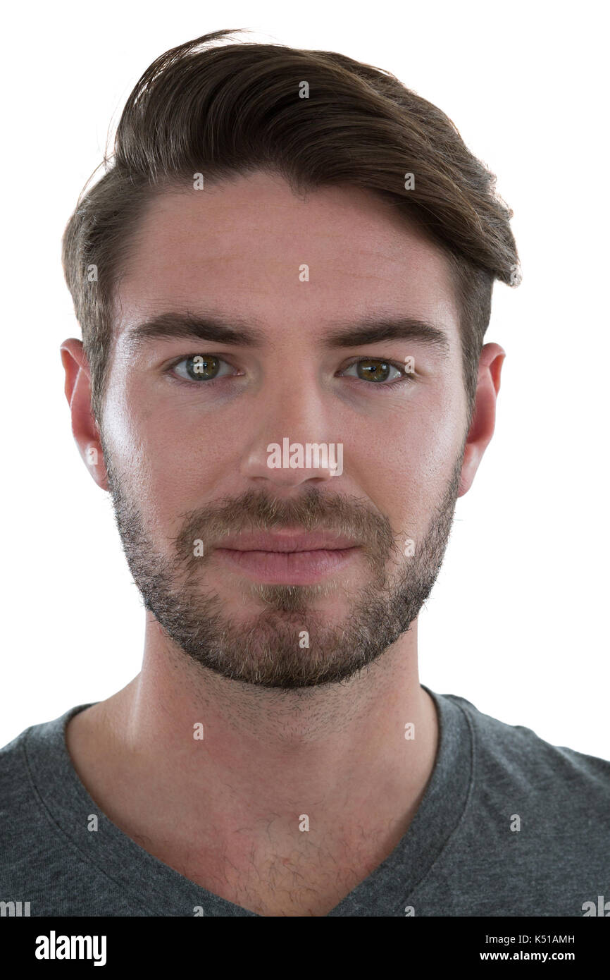 Portrait of man standing against white background Stock Photo - Alamy
