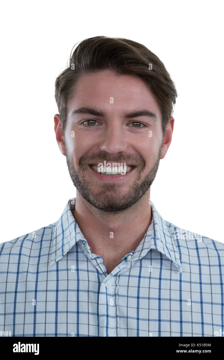 Portrait of man standing against white background Stock Photo - Alamy