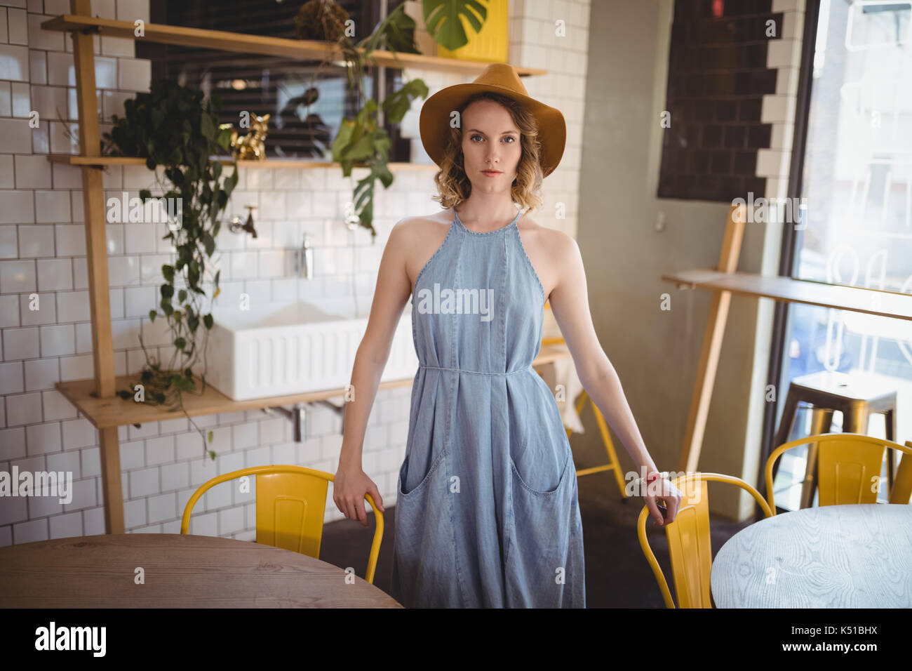 Tables standing hi-res stock photography and images - Alamy