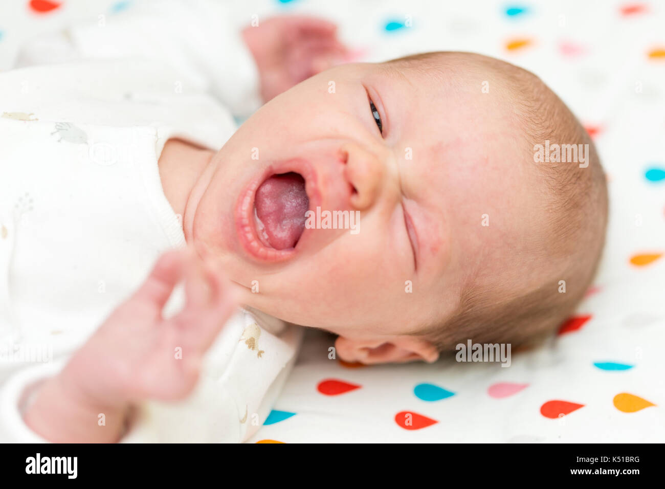 Newborn baby screaming in pain with colics Stock Photo - Alamy
