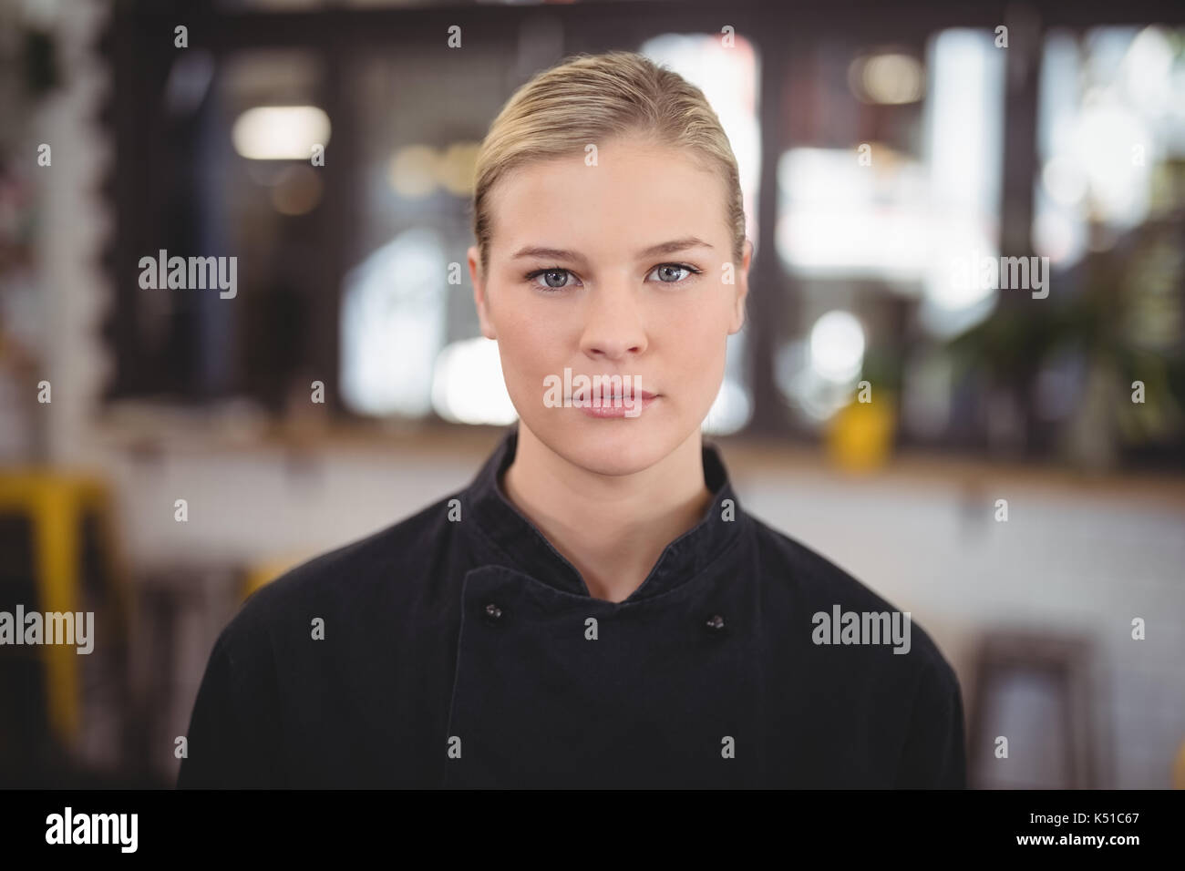 Close up portrait of attractive waitress at coffee shop Stock Photo - Alamy