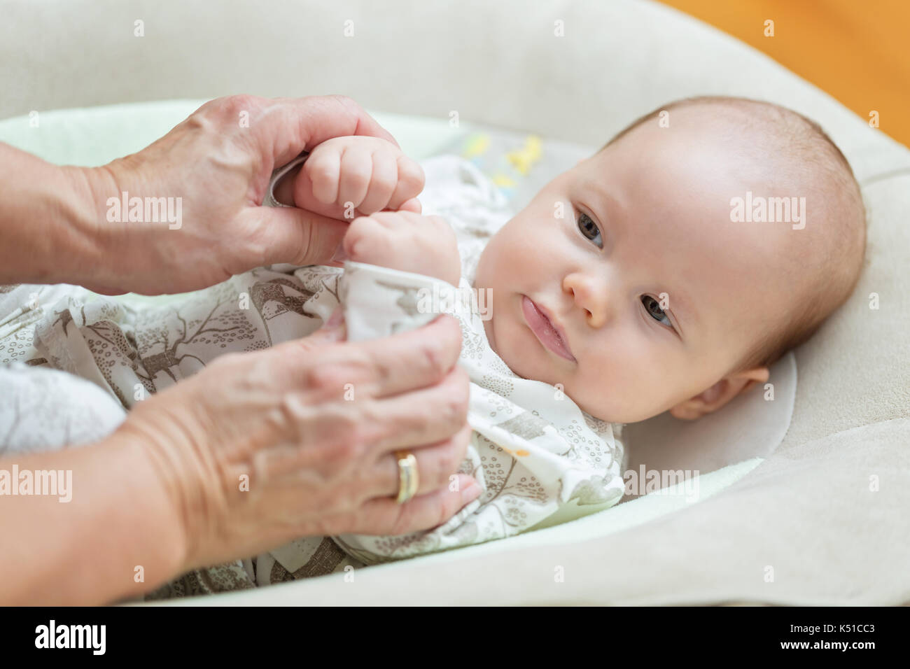 Grandma hold baby hi-res stock photography and images - Alamy