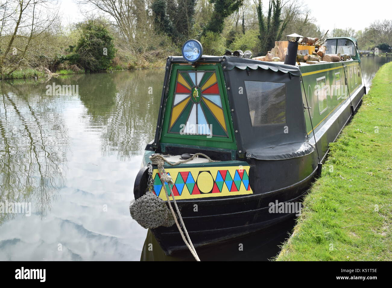 Front of a green canal boat Stock Photo - Alamy