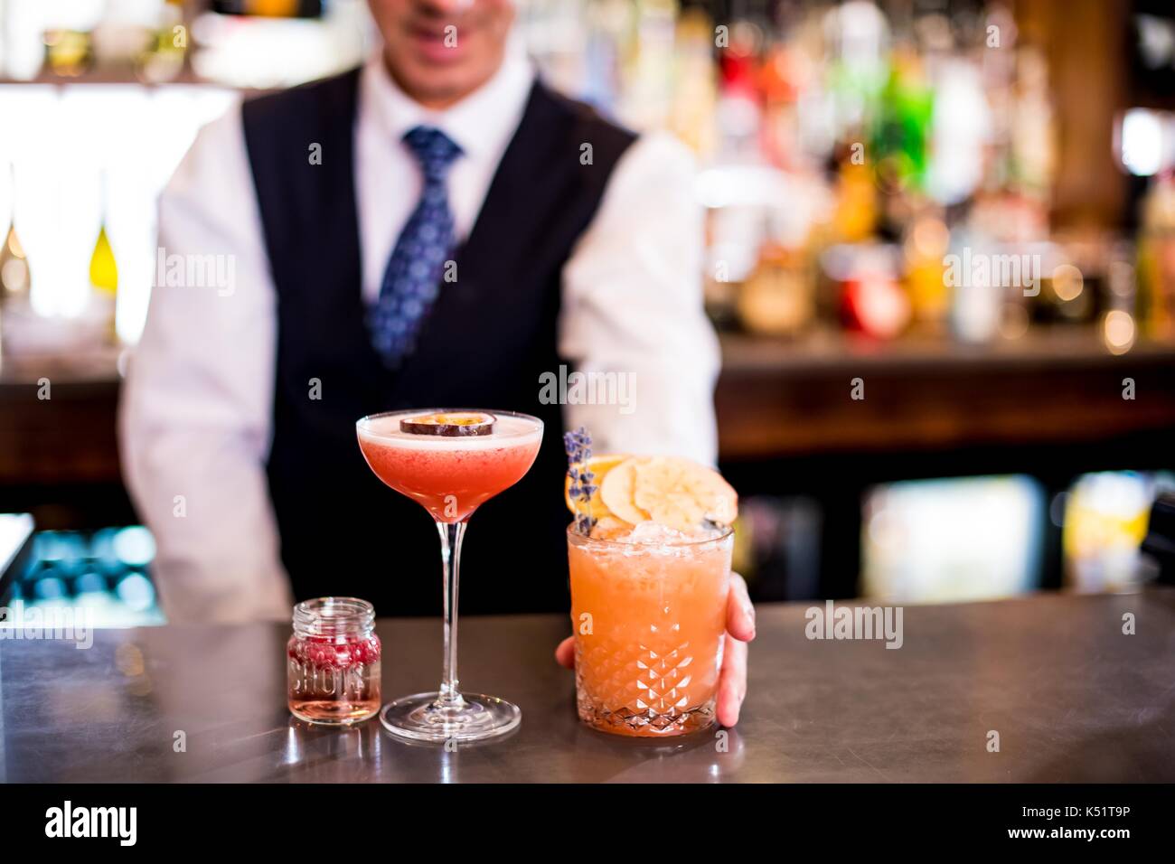 Cocktail drinks on a bar Stock Photo - Alamy
