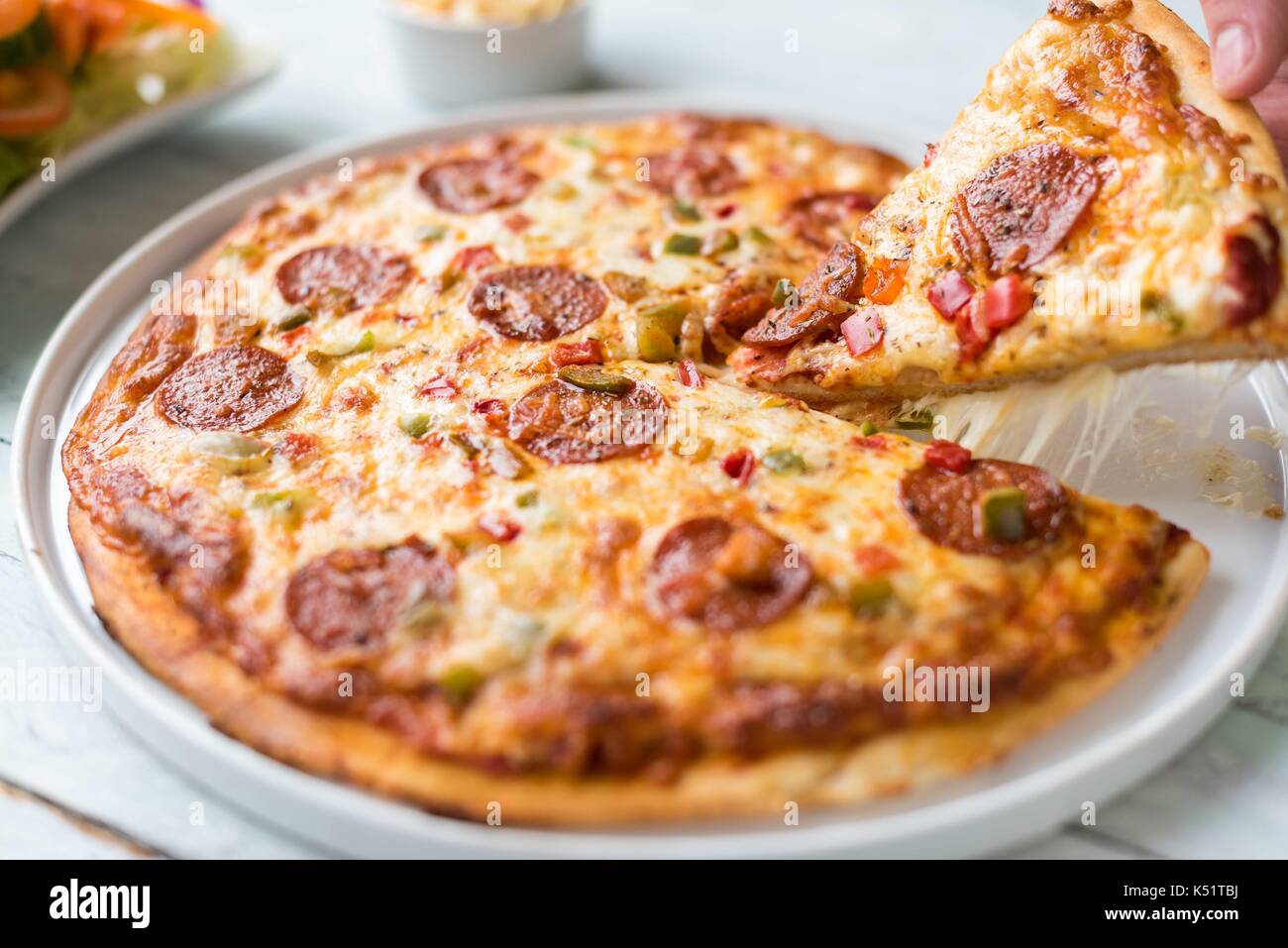 Slize of pizza hi-res stock photography and images - Alamy