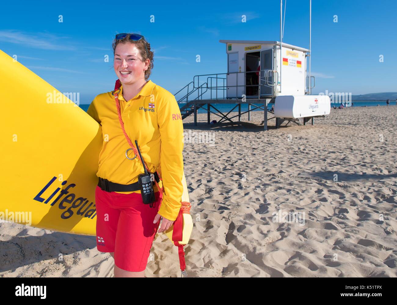 Lifeguard on beach at Sandbanks Dorset UK Stock Photo - Alamy