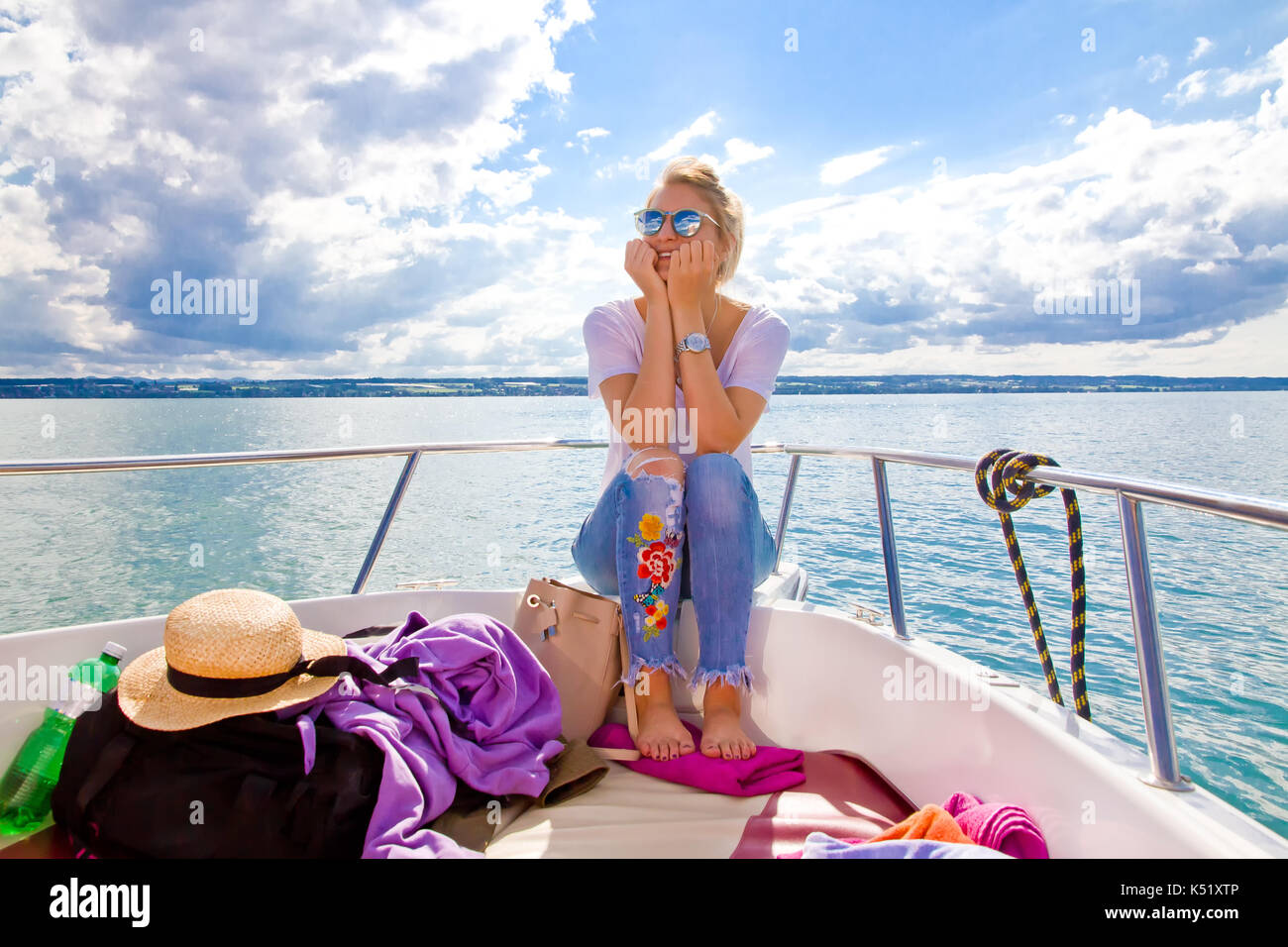 Female driving boat hi-res stock photography and images - Alamy