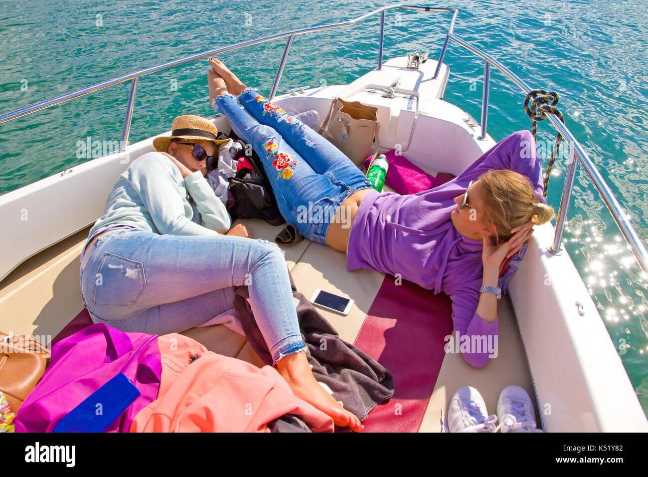 Girl driving a boat hi-res stock photography and images - Alamy