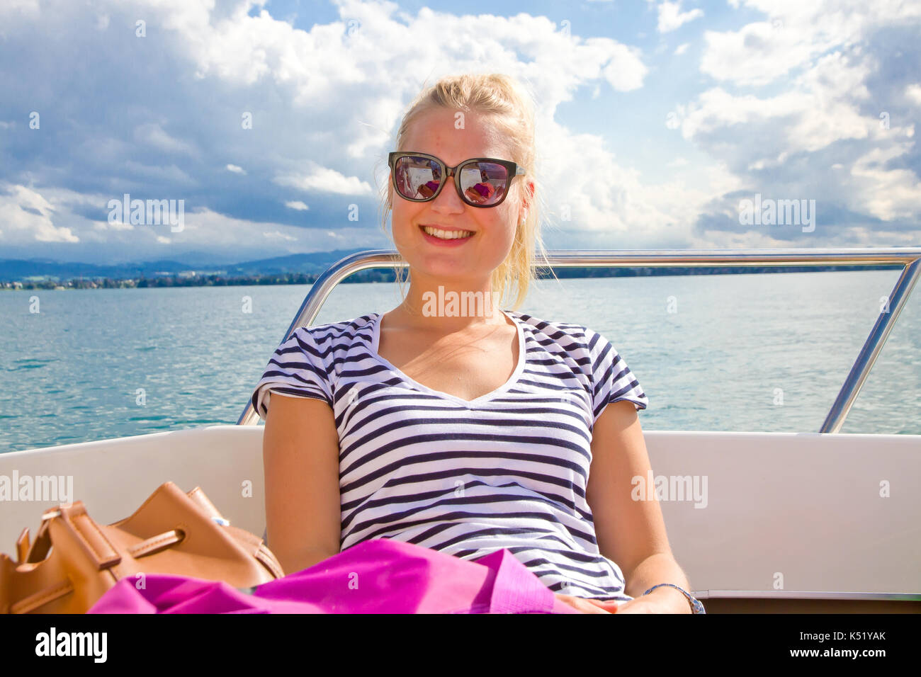 Girl driving a boat hi-res stock photography and images - Alamy