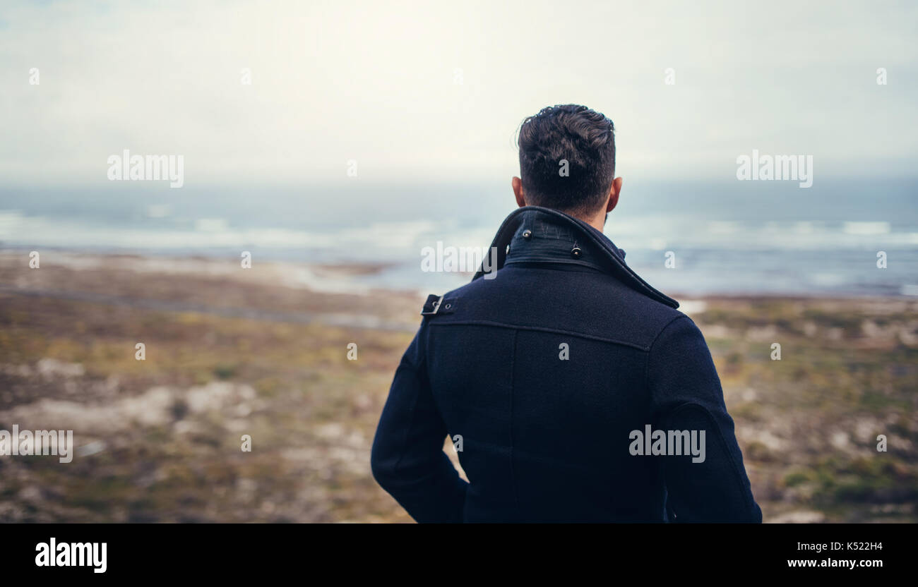 Man looking standing rear hi-res stock photography and images - Alamy