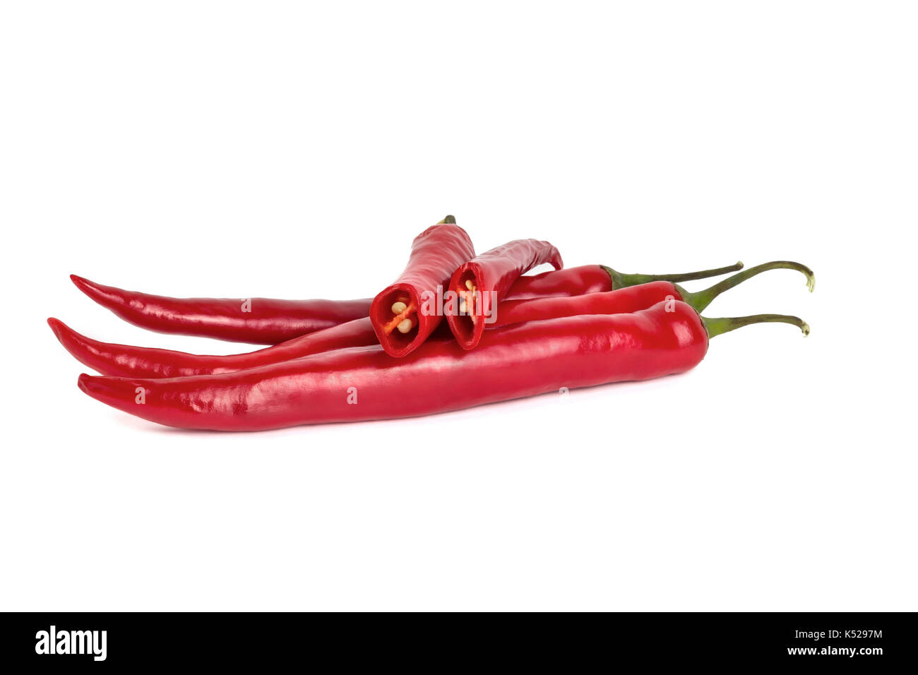 burning red chilli whole and cut Stock Photo - Alamy