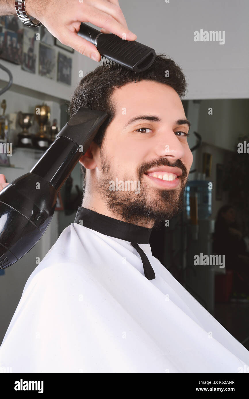 Handsome man in hairdressing saloon hi-res stock photography and images ...