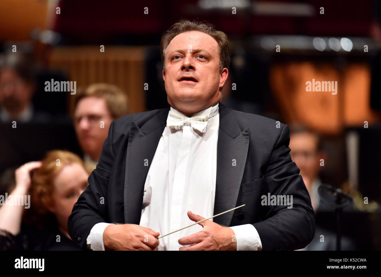 The conductor with the Royal Liverpool Philharmonic Orchestra during ...