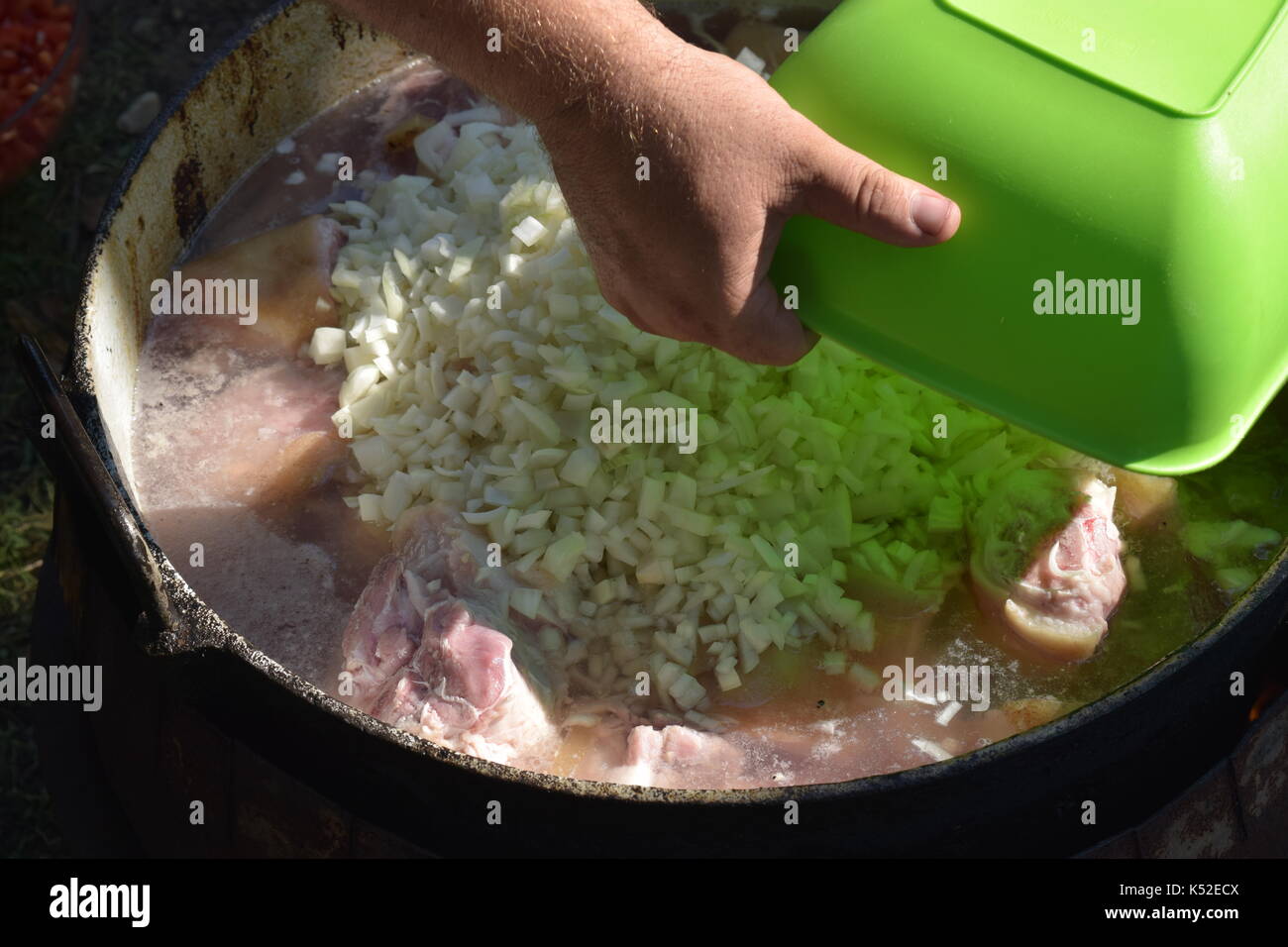Preparation of juicy uncooked stew Stock Photo - Alamy