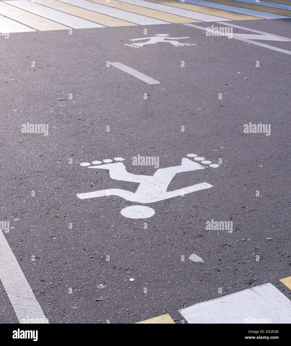 white paint marked path in the park. background Stock Photo - Alamy