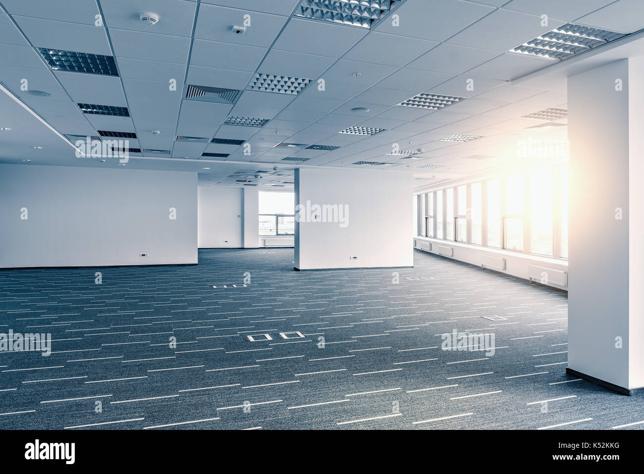 Interior of the new empty office building at sunset time Stock Photo ...